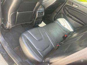 Black Ford Edge 2016 in Siauliai, with an engine capacity of 2.00 L and mileage of 270 thousand km for 9900 €, photo 13 on AUTOMOTO.COM.LV