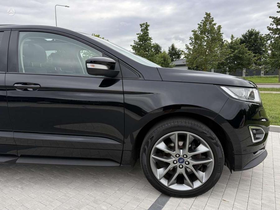 Black Ford Edge 2016 in Siauliai, with an engine capacity of 2.00 L and mileage of 249 thousand km for 16450 €, photo 17 on AUTOMOTO.COM.LV