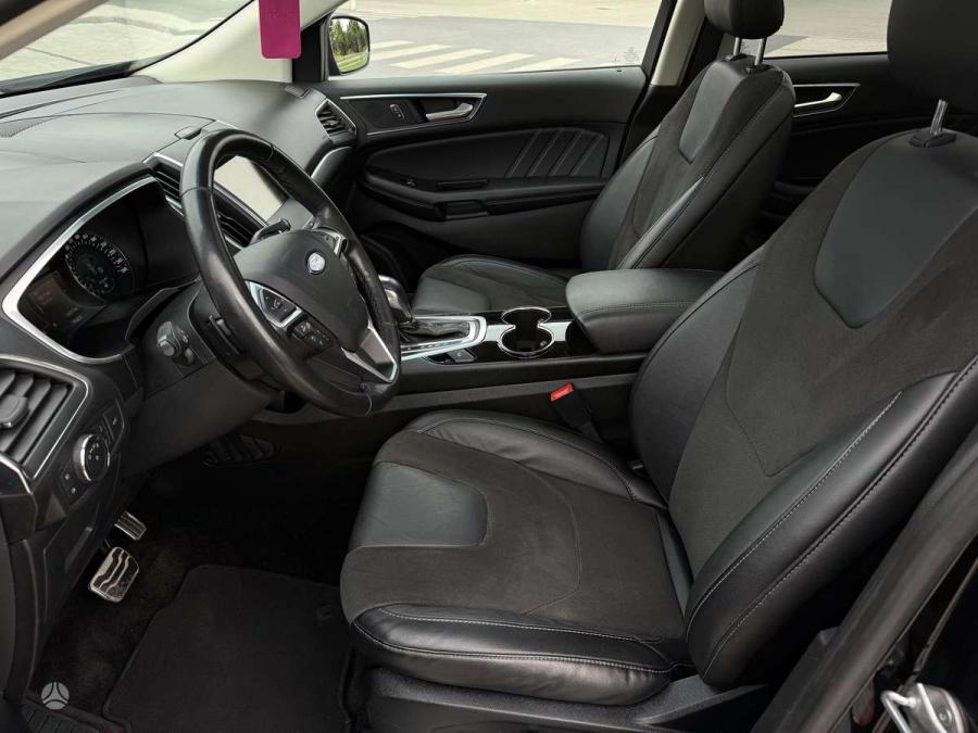 Black Ford Edge 2016 in Siauliai, with an engine capacity of 2.00 L and mileage of 249 thousand km for 16450 €, photo 18 on AUTOMOTO.COM.LV