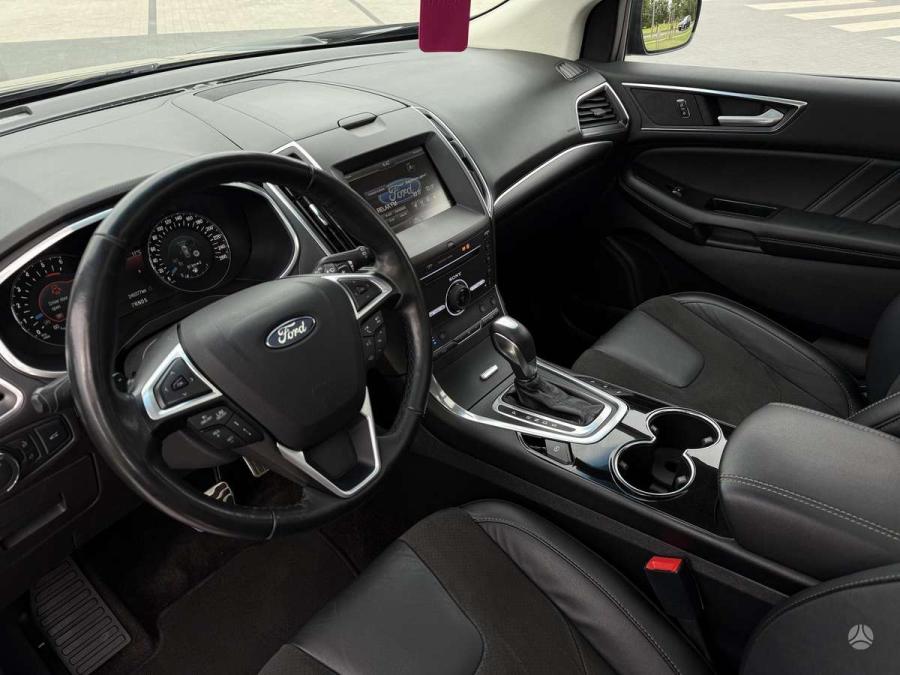 Black Ford Edge 2016 in Siauliai, with an engine capacity of 2.00 L and mileage of 249 thousand km for 16450 €, photo 19 on AUTOMOTO.COM.LV
