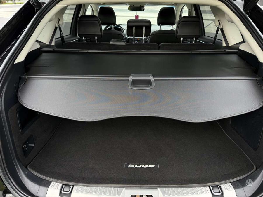 Black Ford Edge 2016 in Siauliai, with an engine capacity of 2.00 L and mileage of 249 thousand km for 16450 €, photo 32 on AUTOMOTO.COM.LV
