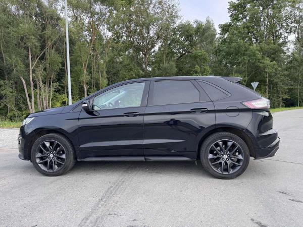 Black Ford Edge 2017 in Panevezys, with an engine capacity of 2.00 L and mileage of 212 thousand km for 14500 €, photo 7 on AUTOMOTO.COM.LV