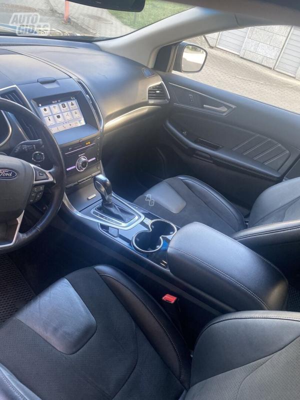 Black Ford Edge 2018 in Vilnius, with an engine capacity of 2.00 L and mileage of 175 thousand km for 18600 €, photo 9 on AUTOMOTO.COM.LV