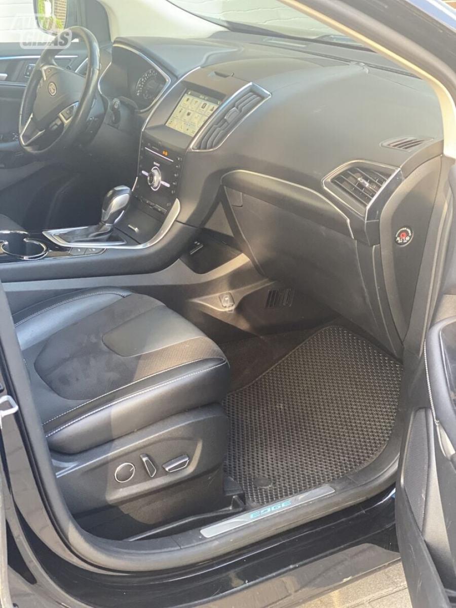Black Ford Edge 2018 in Vilnius, with an engine capacity of 2.00 L and mileage of 175 thousand km for 18600 €, photo 13 on AUTOMOTO.COM.LV