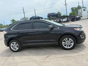Black Ford Edge 2018 in Kretinga, with an engine capacity of 3.50 L and mileage of 131 thousand km for 10000 €, photo 1 on AUTOMOTO.COM.LV