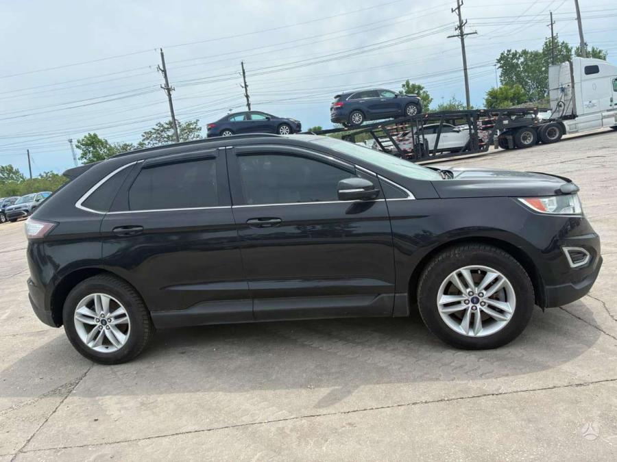 Black Ford Edge 2018 in Kretinga, with an engine capacity of 3.50 L and mileage of 131 thousand km for 10000 €, photo 1 on AUTOMOTO.COM.LV
