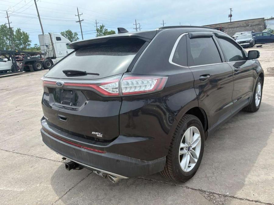 Black Ford Edge 2018 in Kretinga, with an engine capacity of 3.50 L and mileage of 131 thousand km for 10000 €, photo 3 on AUTOMOTO.COM.LV