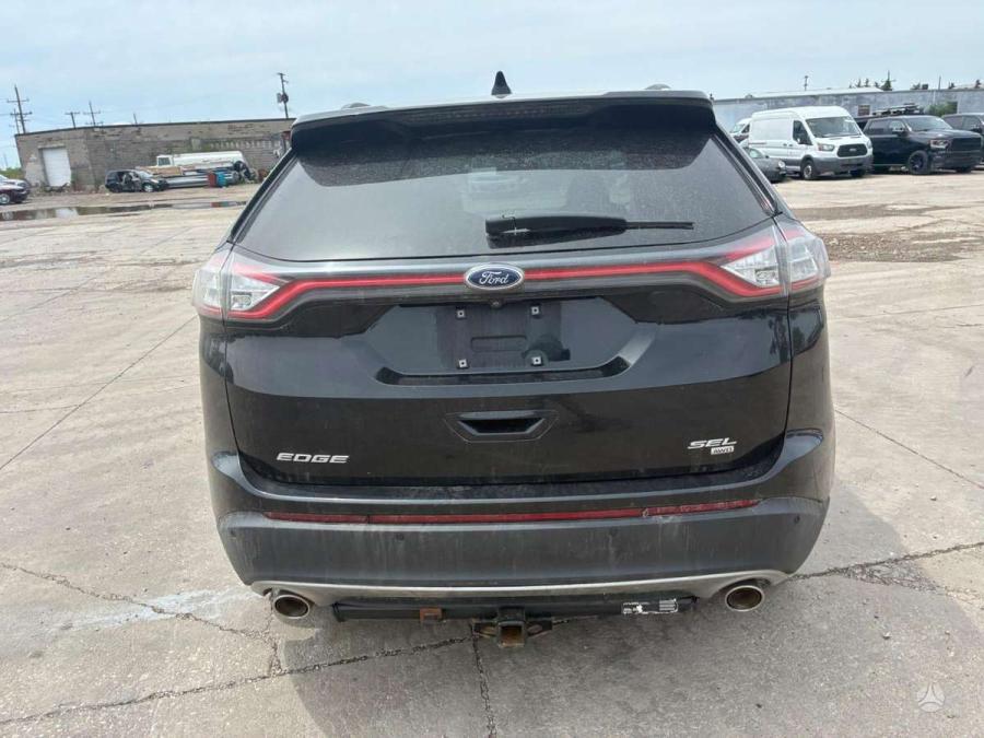 Black Ford Edge 2018 in Kretinga, with an engine capacity of 3.50 L and mileage of 131 thousand km for 10000 €, photo 5 on AUTOMOTO.COM.LV
