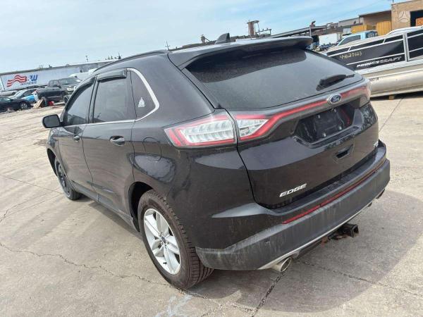 Black Ford Edge 2018 in Kretinga, with an engine capacity of 3.50 L and mileage of 131 thousand km for 10000 €, photo 5 on AUTOMOTO.COM.LV