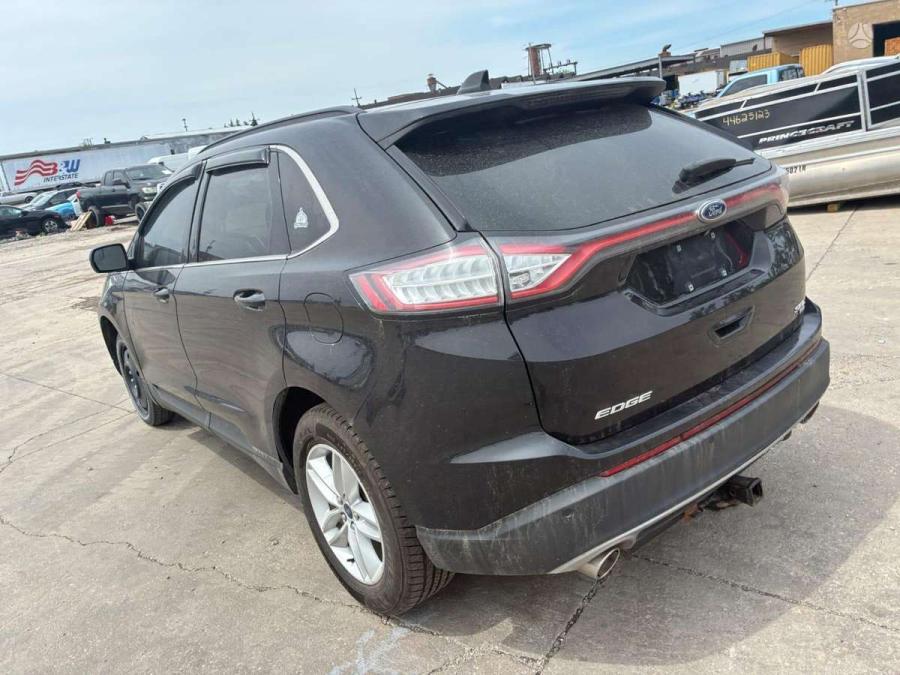 Black Ford Edge 2018 in Kretinga, with an engine capacity of 3.50 L and mileage of 131 thousand km for 10000 €, photo 6 on AUTOMOTO.COM.LV
