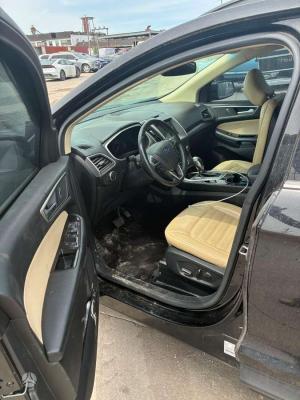 Black Ford Edge 2018 in Kretinga, with an engine capacity of 3.50 L and mileage of 131 thousand km for 10000 €, photo 12 on AUTOMOTO.COM.LV