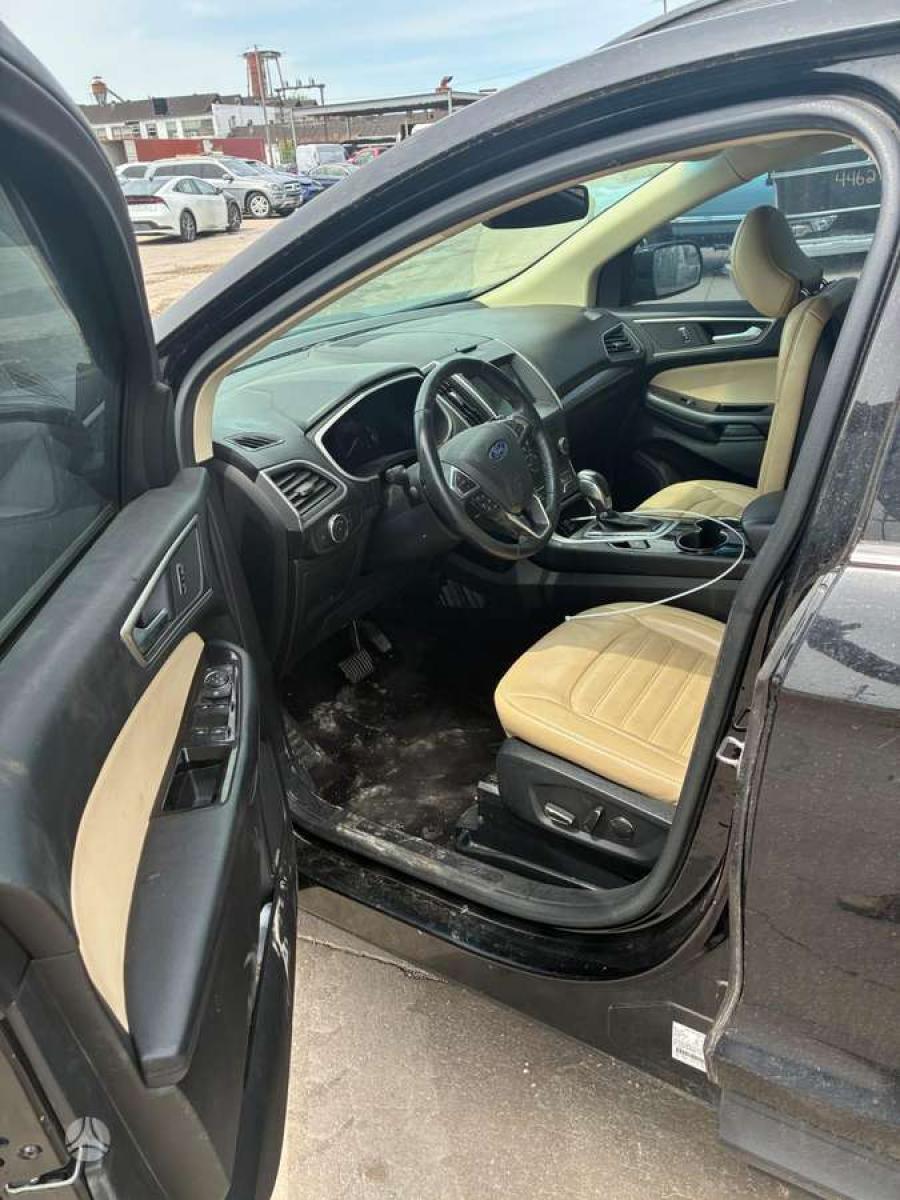 Black Ford Edge 2018 in Kretinga, with an engine capacity of 3.50 L and mileage of 131 thousand km for 10000 €, photo 12 on AUTOMOTO.COM.LV
