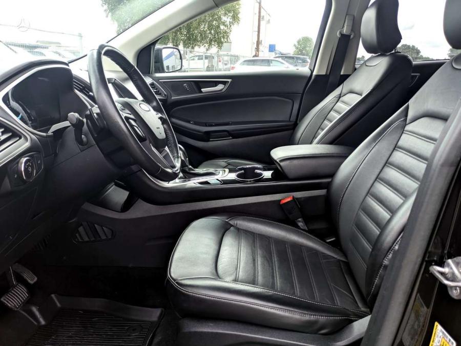 Black Ford Edge 2018 in Kretinga, with an engine capacity of 3.50 L and mileage of 153 thousand km for 15500 €, photo 13 on AUTOMOTO.COM.LV