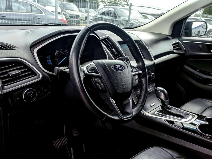 Black Ford Edge 2018 in Kretinga, with an engine capacity of 3.50 L and mileage of 153 thousand km for 15500 €, photo 14 on AUTOMOTO.COM.LV