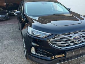 Black Ford Edge 2021 in Vilnius, with an engine capacity of 2.00 L and mileage of 299 thousand km for 13350 €, photo 3 on AUTOMOTO.COM.LV