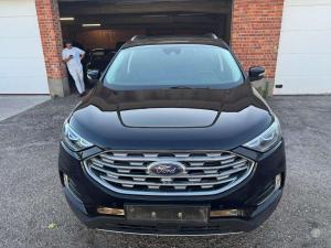 Black Ford Edge 2021 in Vilnius, with an engine capacity of 2.00 L and mileage of 299 thousand km for 13350 €, photo 5 on AUTOMOTO.COM.LV