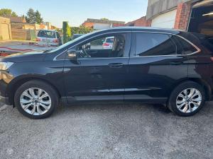 Black Ford Edge 2021 in Vilnius, with an engine capacity of 2.00 L and mileage of 299 thousand km for 13350 €, photo 7 on AUTOMOTO.COM.LV