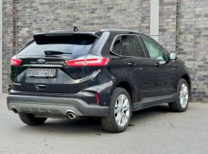 Black Ford Edge 2021 in Vilnius, with an engine capacity of 2.00 L and mileage of 299 thousand km for 13350 €, photo 14 on AUTOMOTO.COM.LV
