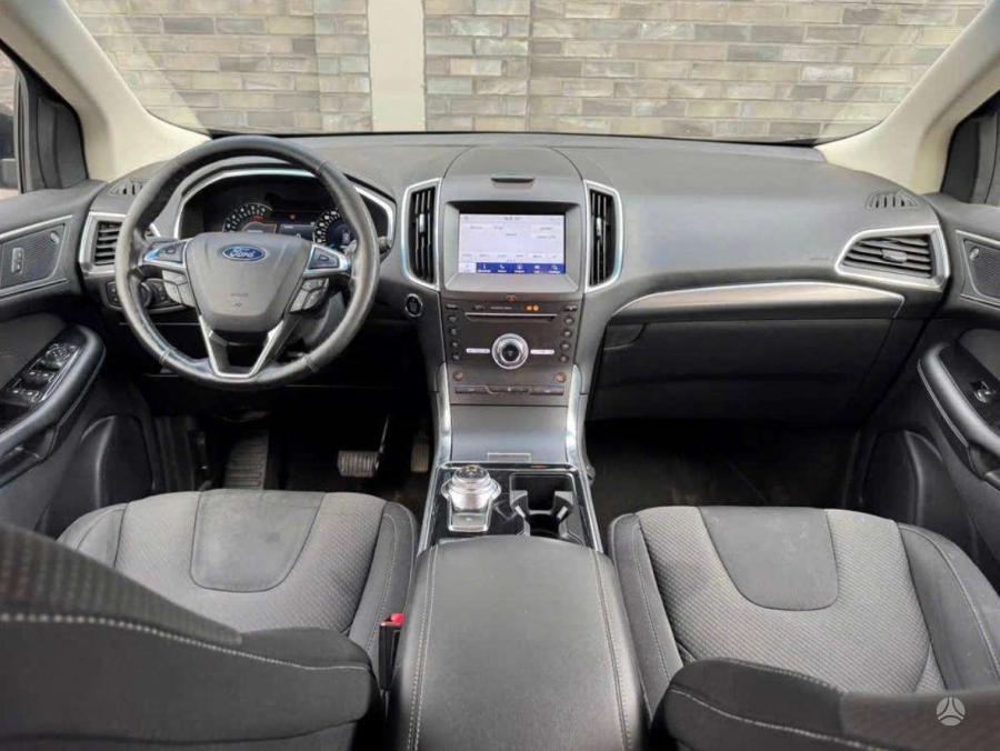 Black Ford Edge 2021 in Vilnius, with an engine capacity of 2.00 L and mileage of 299 thousand km for 13350 €, photo 16 on AUTOMOTO.COM.LV