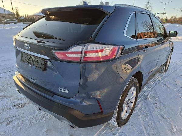 Blue Ford Edge 2019 in Radviliskis, with an engine capacity of 2.00 L and mileage of 80 thousand km for 15400 €, photo 7 on AUTOMOTO.COM.LV