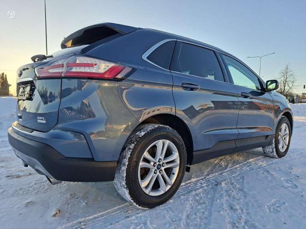 Blue Ford Edge 2019 in Radviliskis, with an engine capacity of 2.00 L and mileage of 80 thousand km for 15400 €, photo 8 on AUTOMOTO.COM.LV
