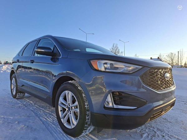 Blue Ford Edge 2019 in Radviliskis, with an engine capacity of 2.00 L and mileage of 80 thousand km for 15400 €, photo 9 on AUTOMOTO.COM.LV