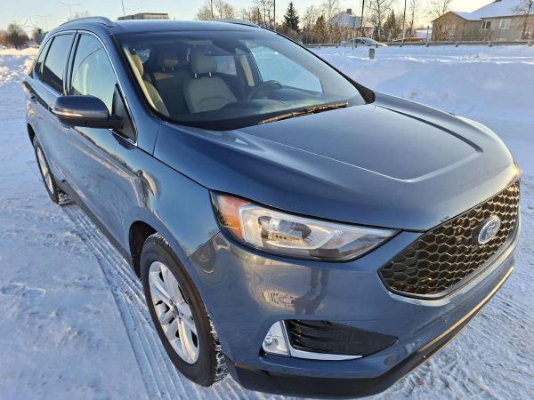 Blue Ford Edge 2019 in Radviliskis, with an engine capacity of 2.00 L and mileage of 80 thousand km for 15400 €, photo 10 on AUTOMOTO.COM.LV