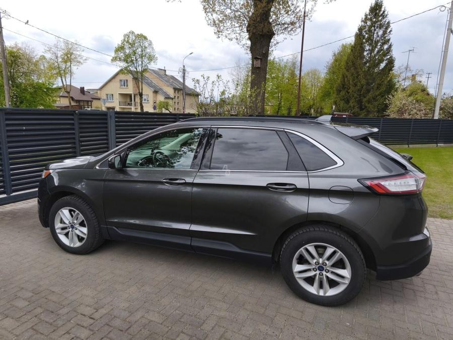 Grey Ford Edge 2017 in Siauliai, with an engine capacity of 2.00 L and mileage of 200 thousand km for 12900 €, photo 11 on AUTOMOTO.COM.LV