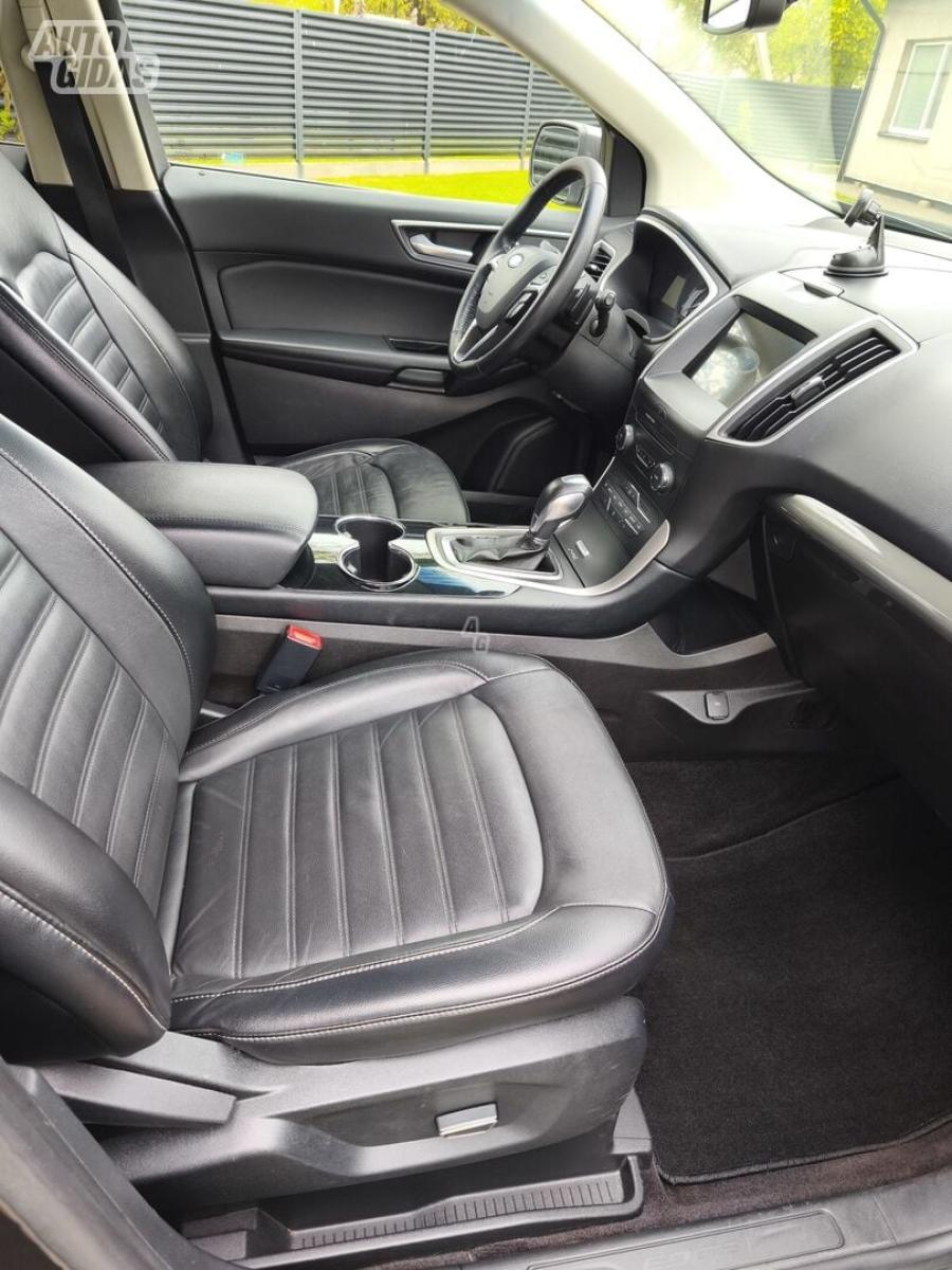 Grey Ford Edge 2017 in Siauliai, with an engine capacity of 2.00 L and mileage of 200 thousand km for 12900 €, photo 15 on AUTOMOTO.COM.LV