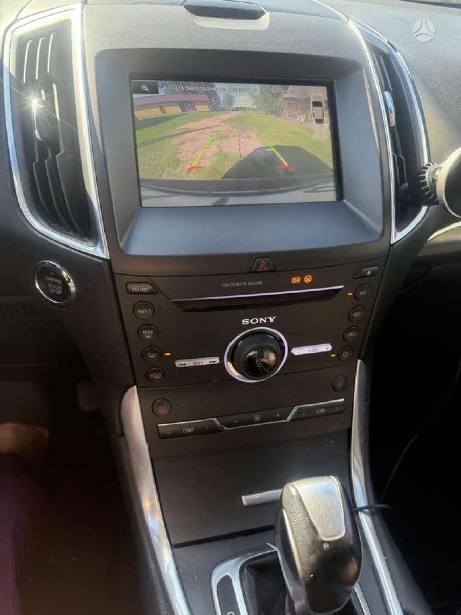 Orange Ford Edge 2016 in Sakiai, with an engine capacity of 2.00 L and mileage of 312 thousand km for 12500 €, photo 6 on AUTOMOTO.COM.LV