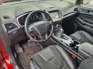 Red Ford Edge 2018 in Siauliai, with an engine capacity of 2.00 L and mileage of 210 thousand km for 14200 €, photo 18 on AUTOMOTO.COM.LV