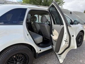 White Ford Edge 2013 in Vilnius, with an engine capacity of 2.00 L and mileage of 193 thousand km for 5500 €, photo 12 on AUTOMOTO.COM.LV