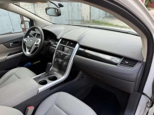 White Ford Edge 2013 in Vilnius, with an engine capacity of 2.00 L and mileage of 193 thousand km for 5500 €, photo 14 on AUTOMOTO.COM.LV