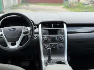 White Ford Edge 2013 in Vilnius, with an engine capacity of 2.00 L and mileage of 193 thousand km for 5500 €, photo 16 on AUTOMOTO.COM.LV