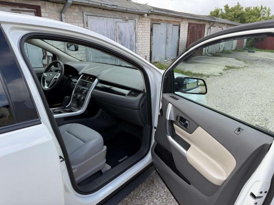 White Ford Edge 2013 in Vilnius, with an engine capacity of 2.00 L and mileage of 193 thousand km for 5500 €, photo 17 on AUTOMOTO.COM.LV