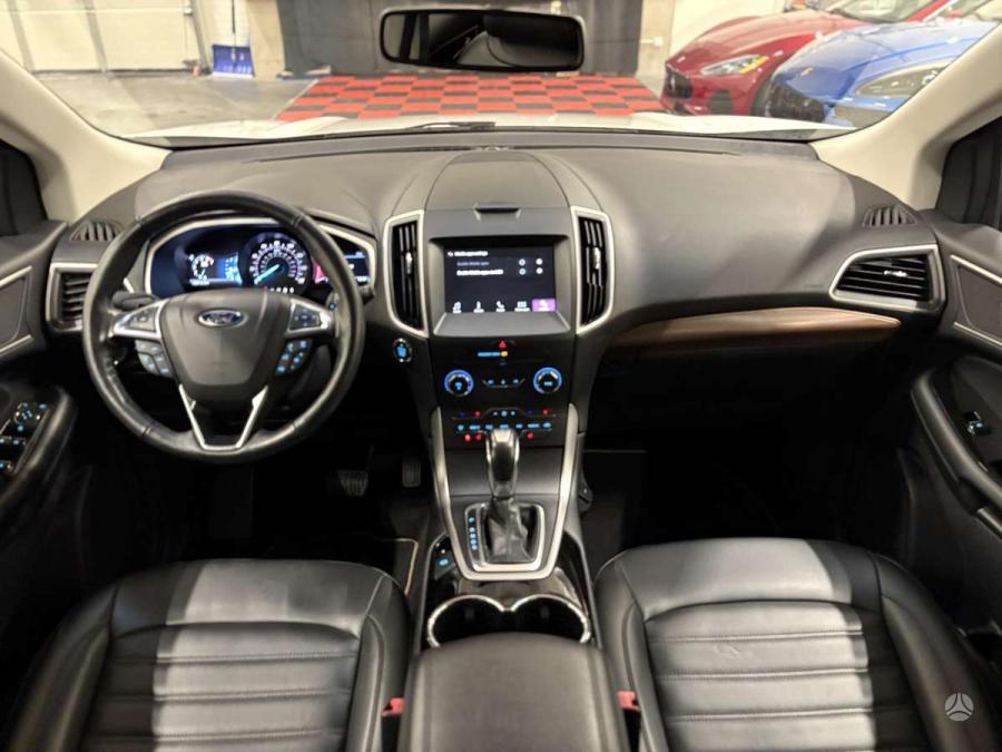 White Ford Edge 2018 in Vilnius, with an engine capacity of 1.99 L and mileage of 93 thousand km for 16590 €, photo 17 on AUTOMOTO.COM.LV