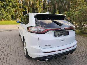 White Ford Edge 2018 in Ukmerge, with an engine capacity of 2.00 L and mileage of 244 thousand km for 13300 €, photo 10 on AUTOMOTO.COM.LV