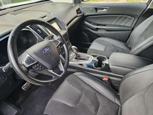 White Ford Edge 2018 in Ukmerge, with an engine capacity of 2.00 L and mileage of 244 thousand km for 13300 €, photo 18 on AUTOMOTO.COM.LV