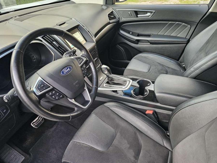 White Ford Edge 2018 in Ukmerge, with an engine capacity of 2.00 L and mileage of 244 thousand km for 13300 €, photo 18 on AUTOMOTO.COM.LV