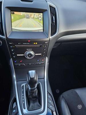 White Ford Edge 2018 in Ukmerge, with an engine capacity of 2.00 L and mileage of 244 thousand km for 13300 €, photo 31 on AUTOMOTO.COM.LV