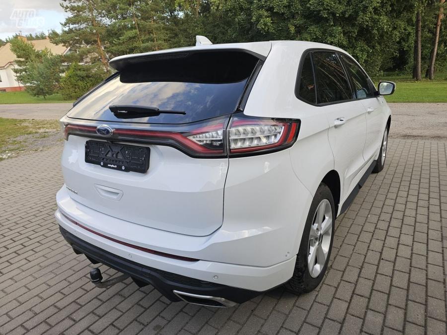 White Ford Edge 2018 in Ukmerge, with an engine capacity of 2.00 L and mileage of 244 thousand km for 12500 €, photo 13 on AUTOMOTO.COM.LV