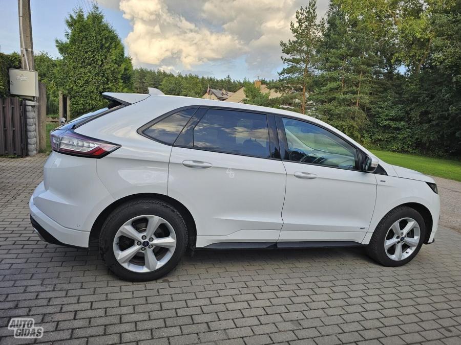 White Ford Edge 2018 in Ukmerge, with an engine capacity of 2.00 L and mileage of 244 thousand km for 12500 €, photo 14 on AUTOMOTO.COM.LV