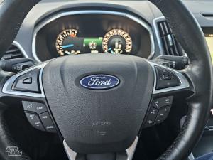 White Ford Edge 2018 in Ukmerge, with an engine capacity of 2.00 L and mileage of 244 thousand km for 12500 €, photo 21 on AUTOMOTO.COM.LV