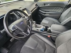 White Ford Edge 2018 in Ukmerge, with an engine capacity of 2.00 L and mileage of 244 thousand km for 12500 €, photo 23 on AUTOMOTO.COM.LV
