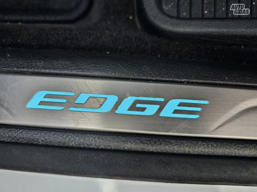 White Ford Edge 2018 in Ukmerge, with an engine capacity of 2.00 L and mileage of 244 thousand km for 12500 €, photo 26 on AUTOMOTO.COM.LV