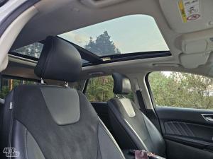 White Ford Edge 2018 in Ukmerge, with an engine capacity of 2.00 L and mileage of 244 thousand km for 12500 €, photo 31 on AUTOMOTO.COM.LV