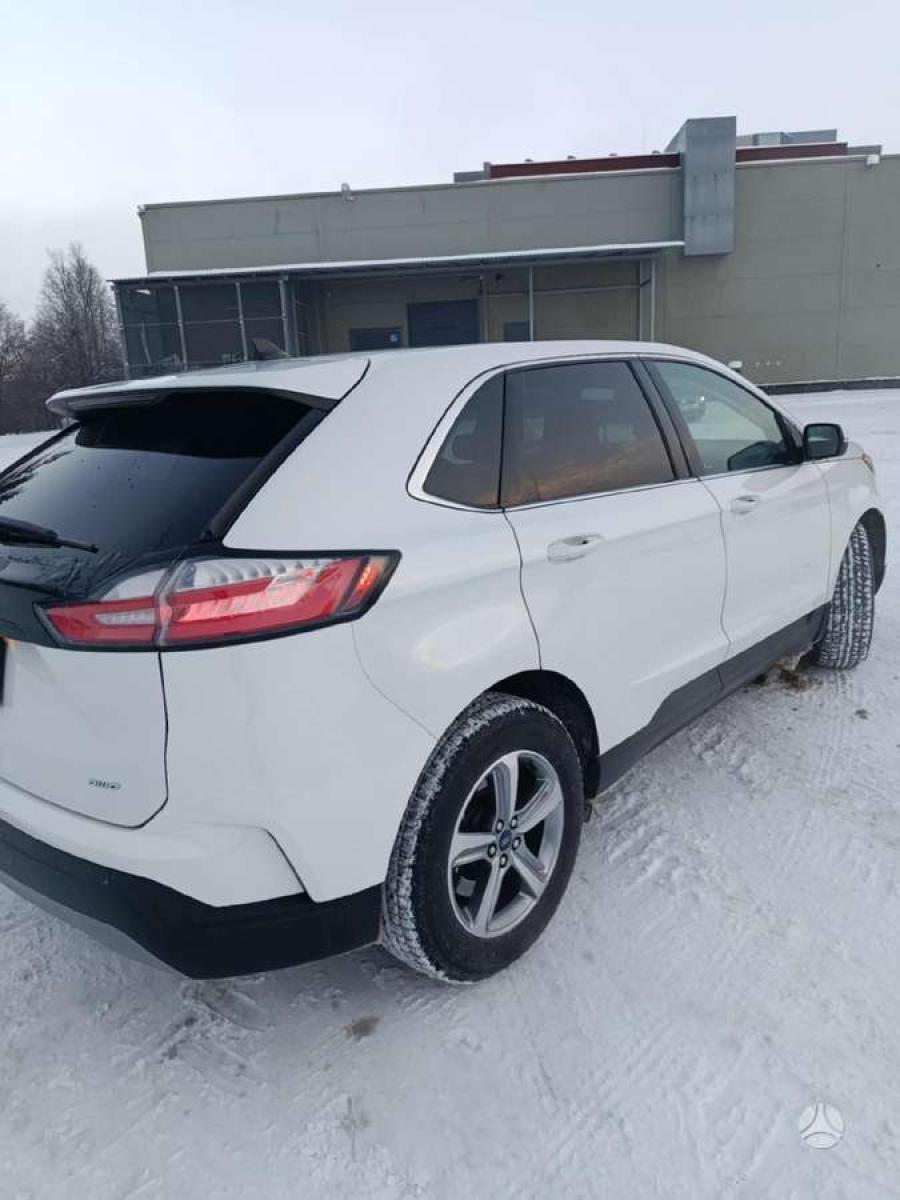 White Ford Edge 2022 in Siauliai, with an engine capacity of 2.00 L and mileage of 69 thousand km for 19999 €, photo 4 on AUTOMOTO.COM.LV