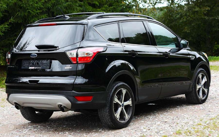 Black Ford Escape 2017 in Kretinga, with an engine capacity of 2.00 L and mileage of 133 thousand km for 11999 €, photo 13 on AUTOMOTO.COM.LV