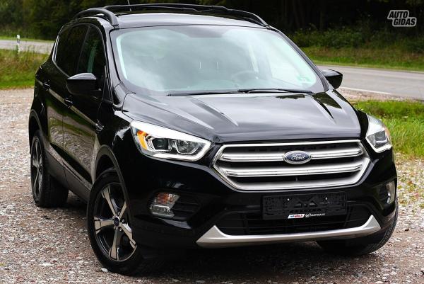 Black Ford Escape 2017 in Petrikaiciai, with an engine capacity of 2.00 L and mileage of 133 thousand km for 11999 €, photo 1 on AUTOMOTO.COM.LV