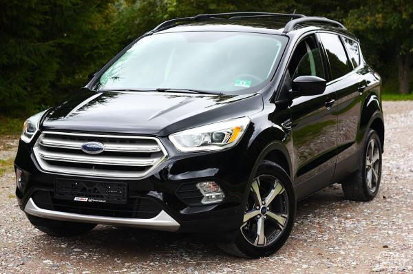 Black Ford Escape 2017 in Petrikaiciai, with an engine capacity of 2.00 L and mileage of 133 thousand km for 11999 €, photo 3 on AUTOMOTO.COM.LV